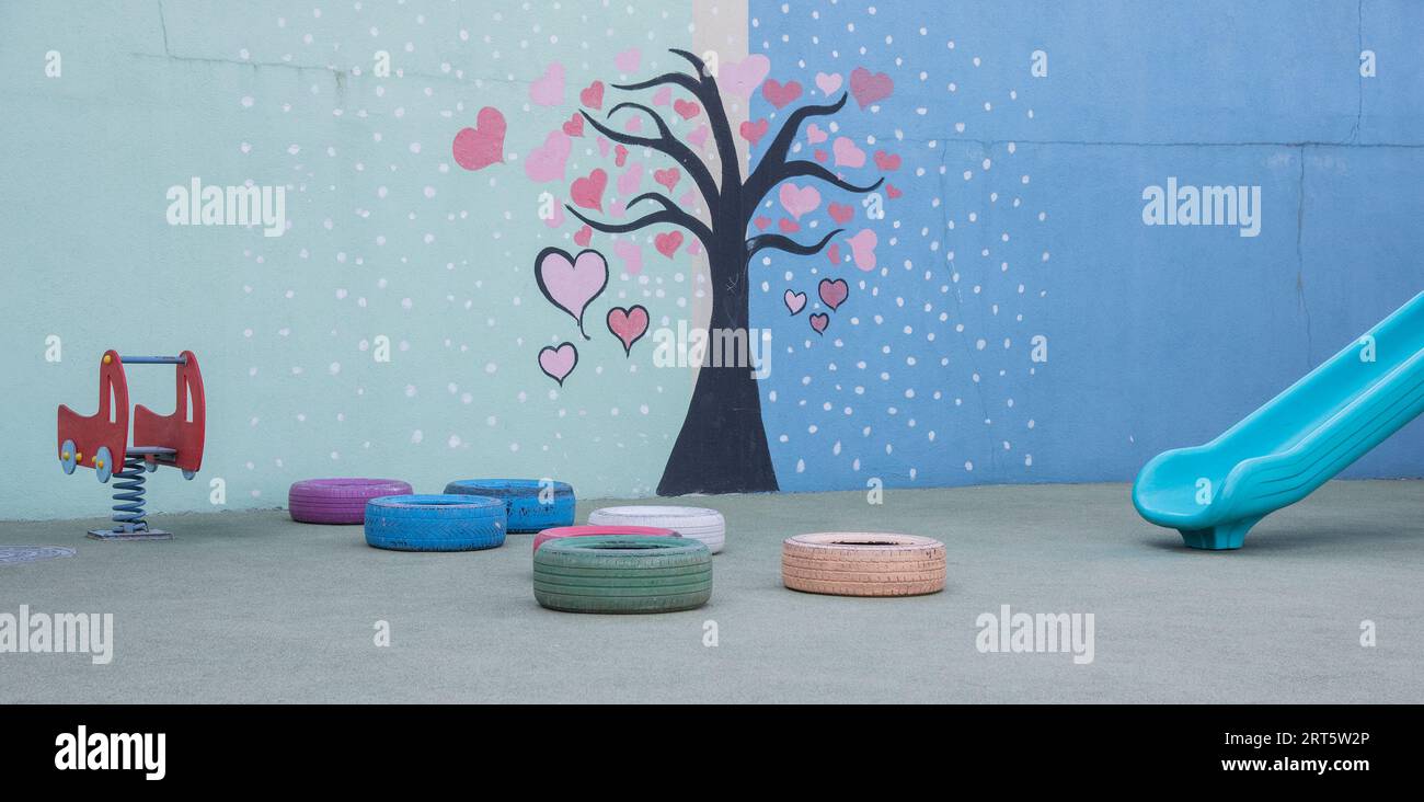 The painted wall in the building of the kindergarten. The color ...