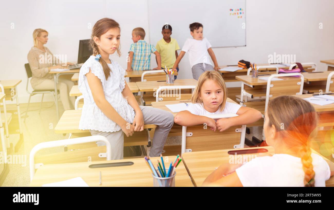 Kids pupils talking during recess between lessons Stock Photo - Alamy