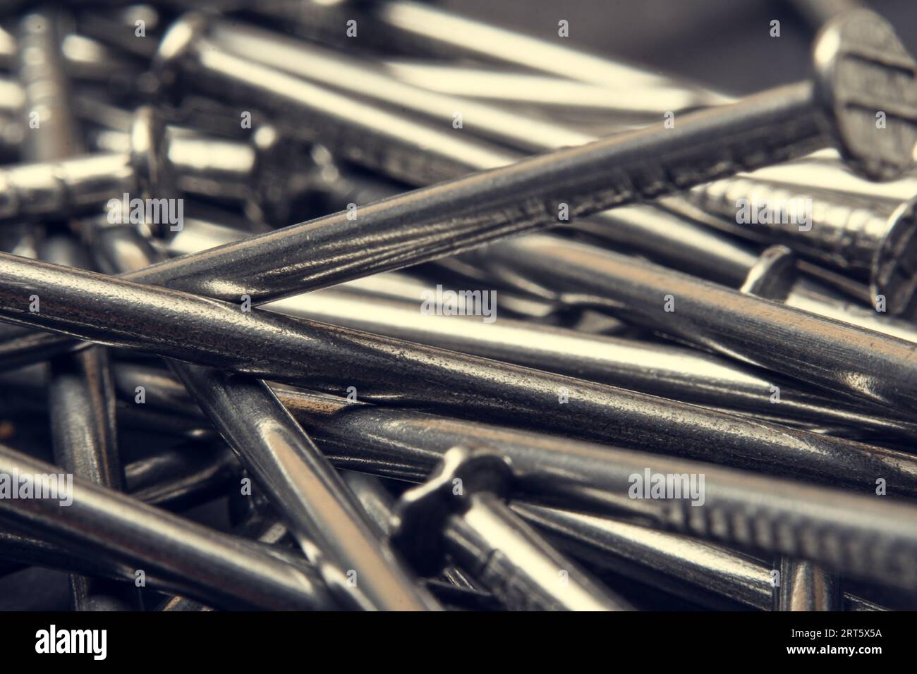 Iron nails texture background close up Stock Photo - Alamy