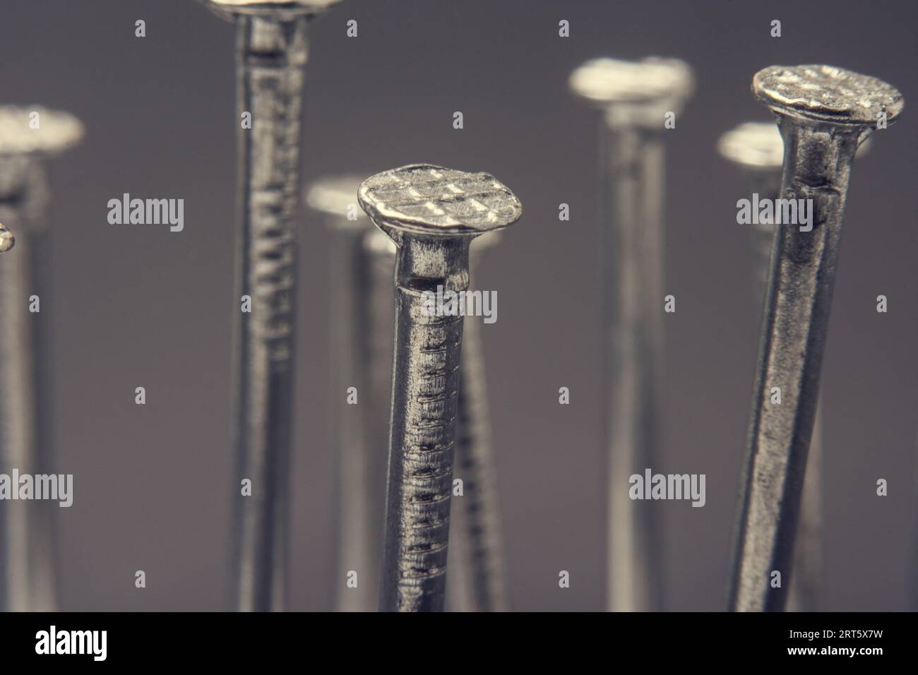 Iron nails texture background close up Stock Photo - Alamy