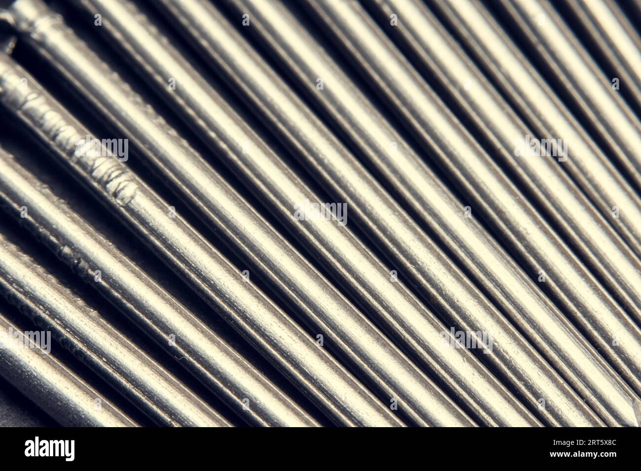 Iron nails texture background close up Stock Photo - Alamy
