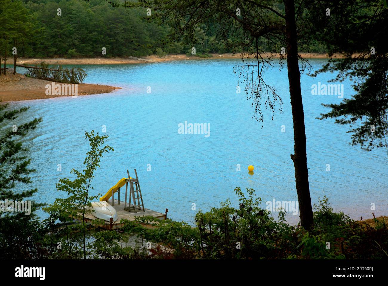 Yellow slide on small dock at Lake Blue Ridge in Georgia Stock Photo ...