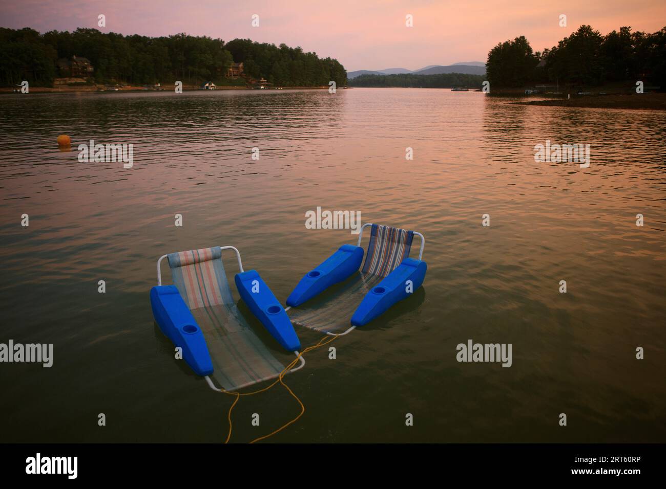 Two floats at sunset Lake Blue Ridge, Georgia Stock Photo - Alamy
