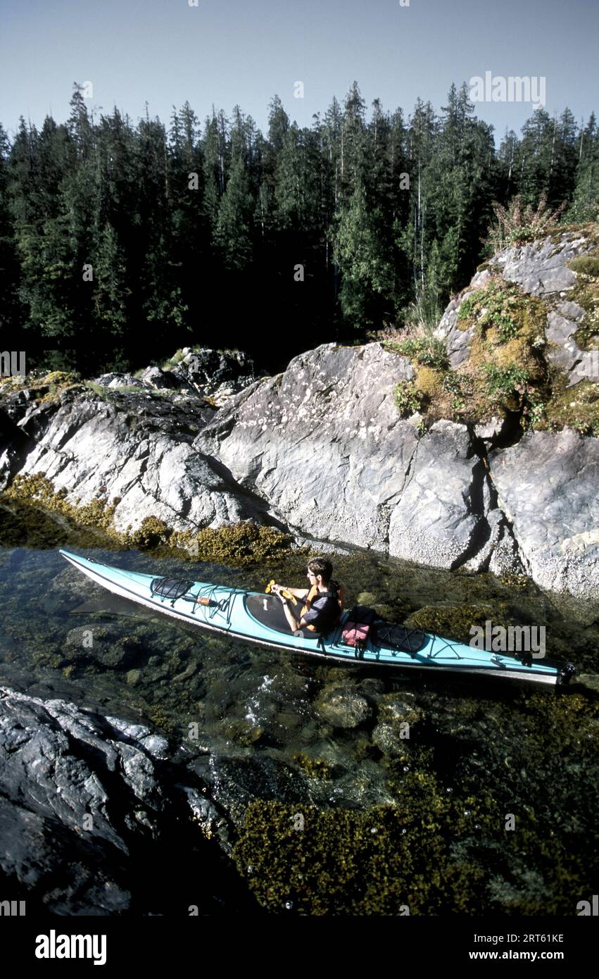 Sea kayaking in Clayoquot Sound Biosphere reserve, Vancouver Island, BC ...