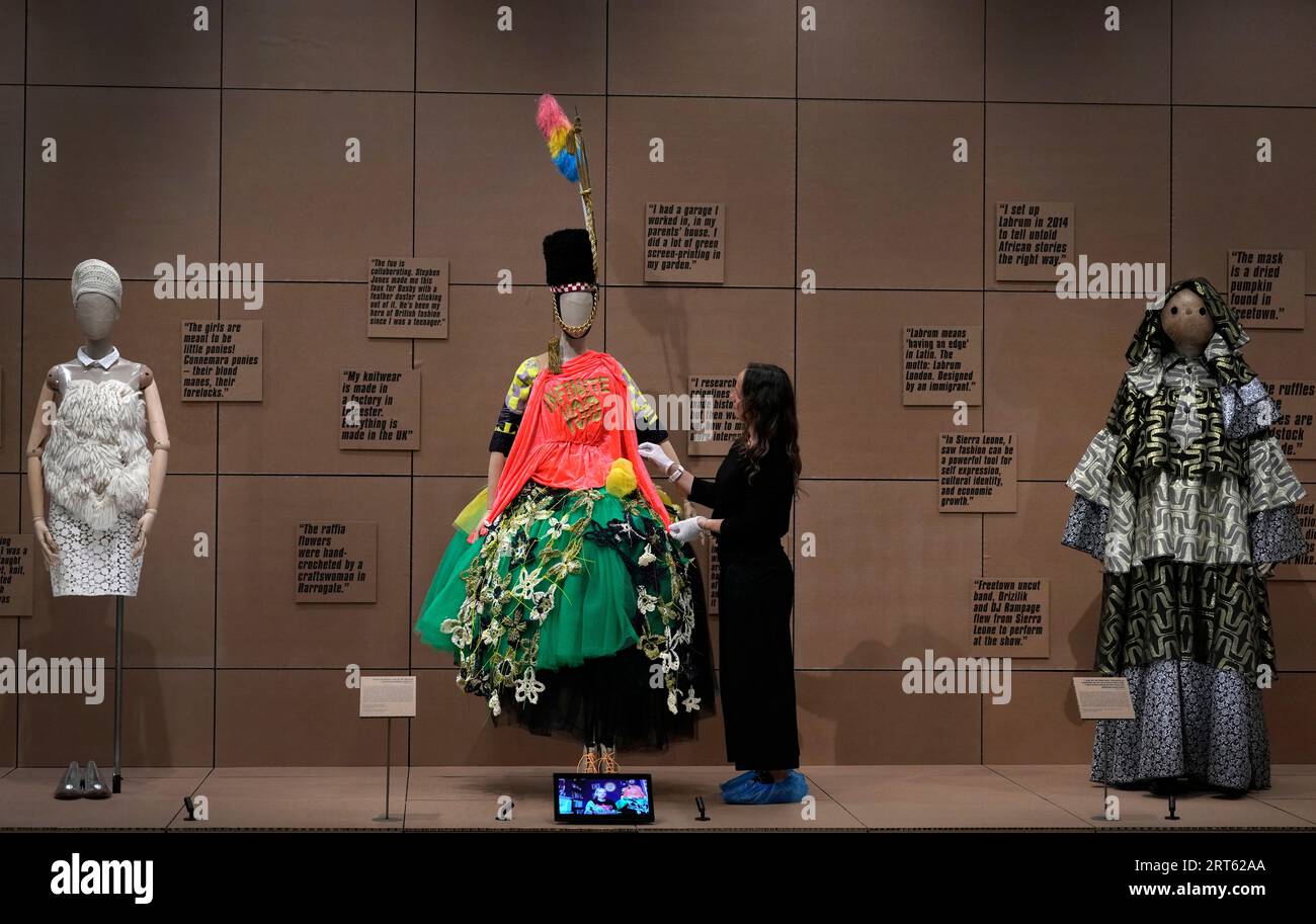 A Design Museum employee adjusts a composite ensemble from Spring ...