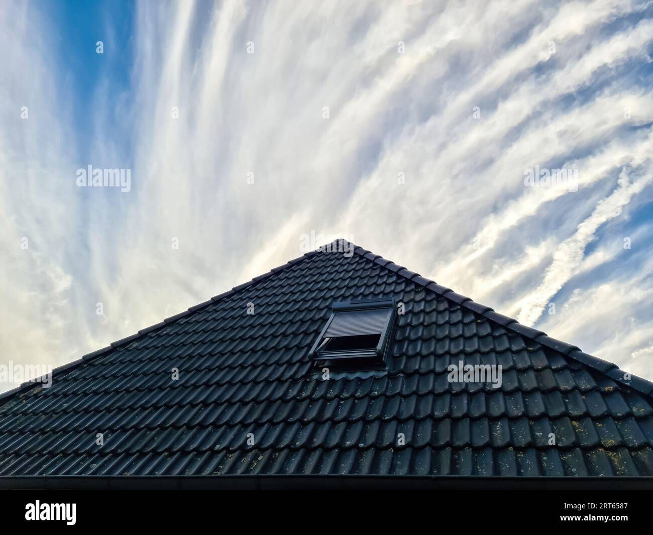Open Roof Window In Velux Style With Black Roof Tiles Stock Photo - Alamy
