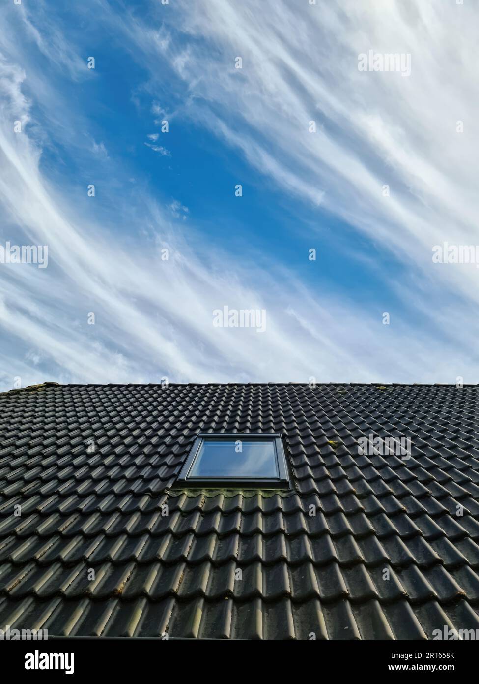 Open Roof Window In Velux Style With Black Roof Tiles Stock Photo - Alamy