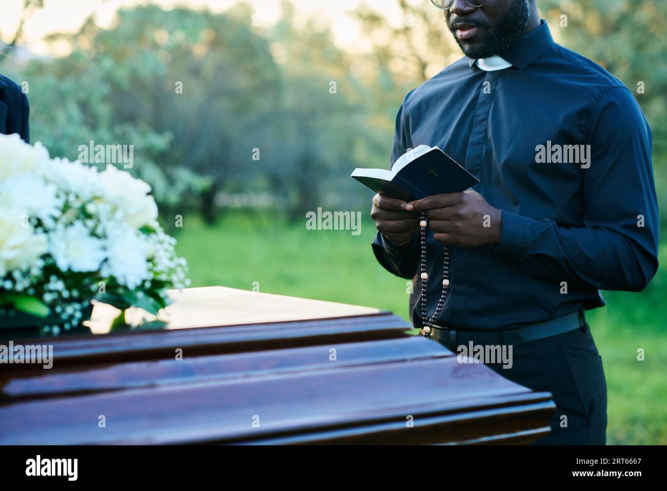 Chaplain reading the bible hi-res stock photography and images - Alamy