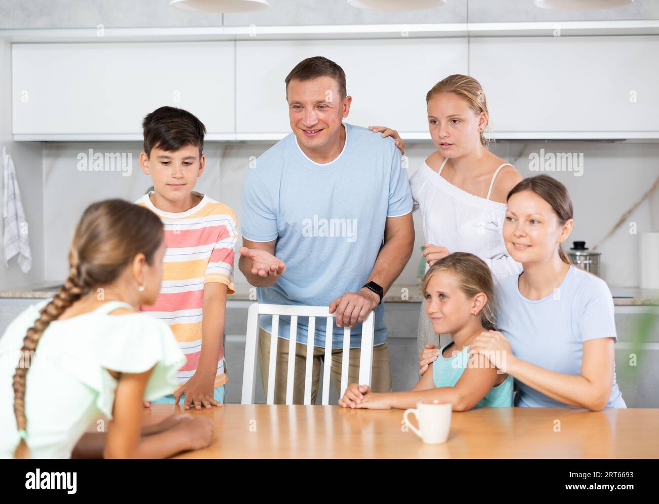 Big family discussing Stock Photo - Alamy