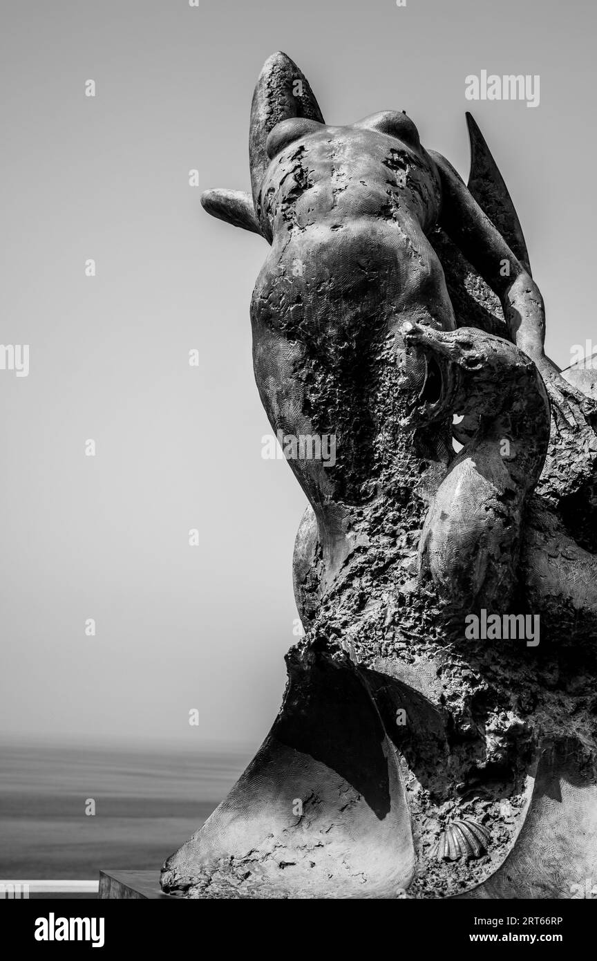 A grayscale of the sculpture of Scilla and Charybdis in Calabria, Italy ...