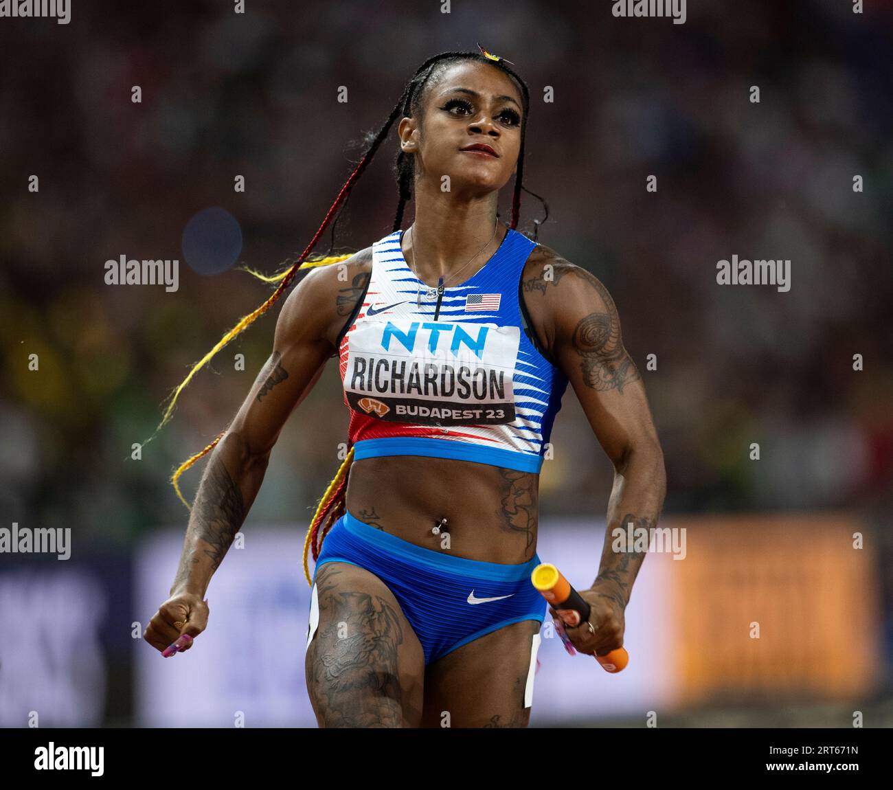 Sha'Carri Richardson of team USA competing in the 4x100m relay on day ...