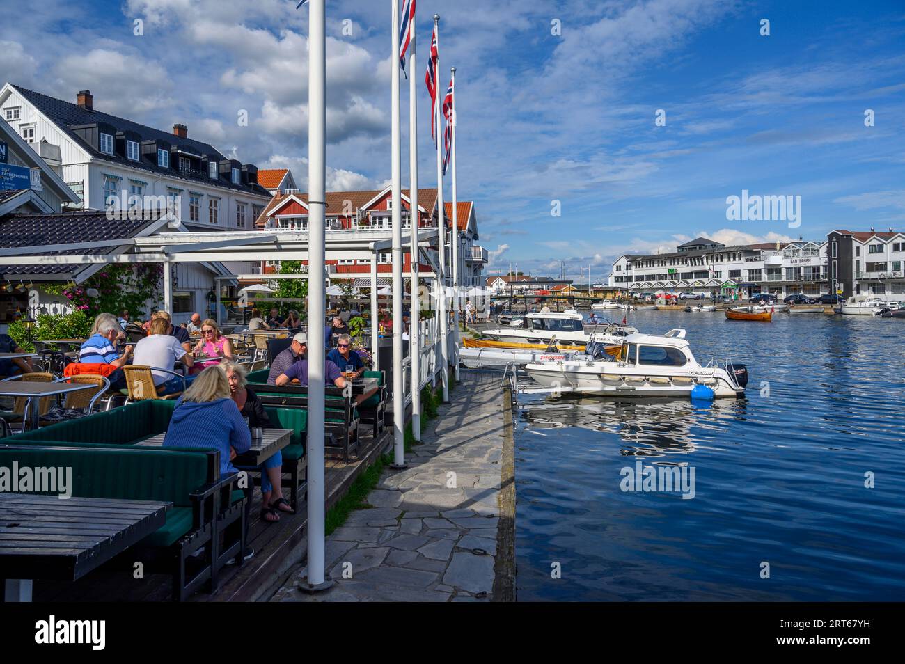 Outdoor café and part of the leisure boat harbour in the well kept and ...