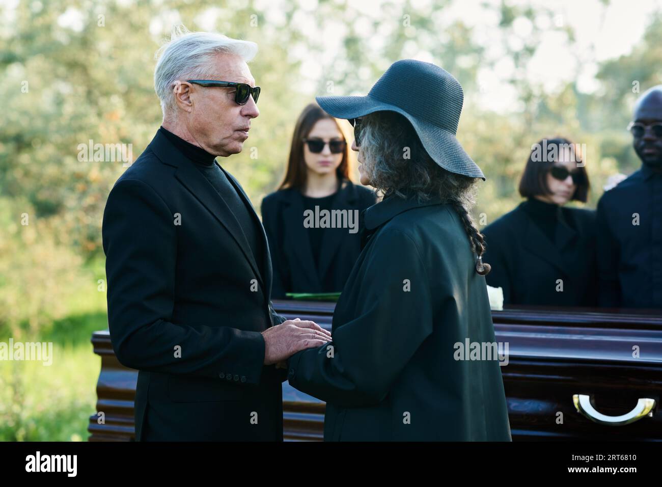 With her family at the funeral of her husband hi-res stock photography ...