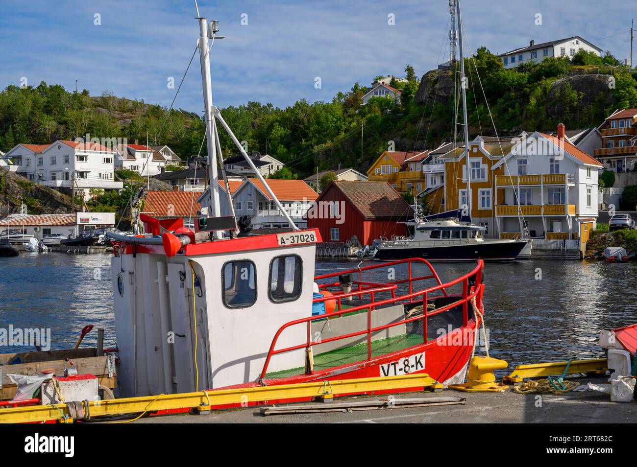 A fishing boat at quay in the well kept and charming seaside town of ...
