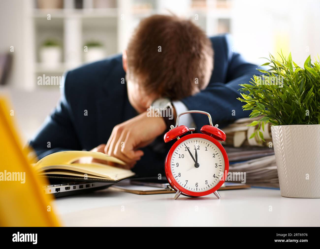 Businessman shows clock hi-res stock photography and images - Alamy