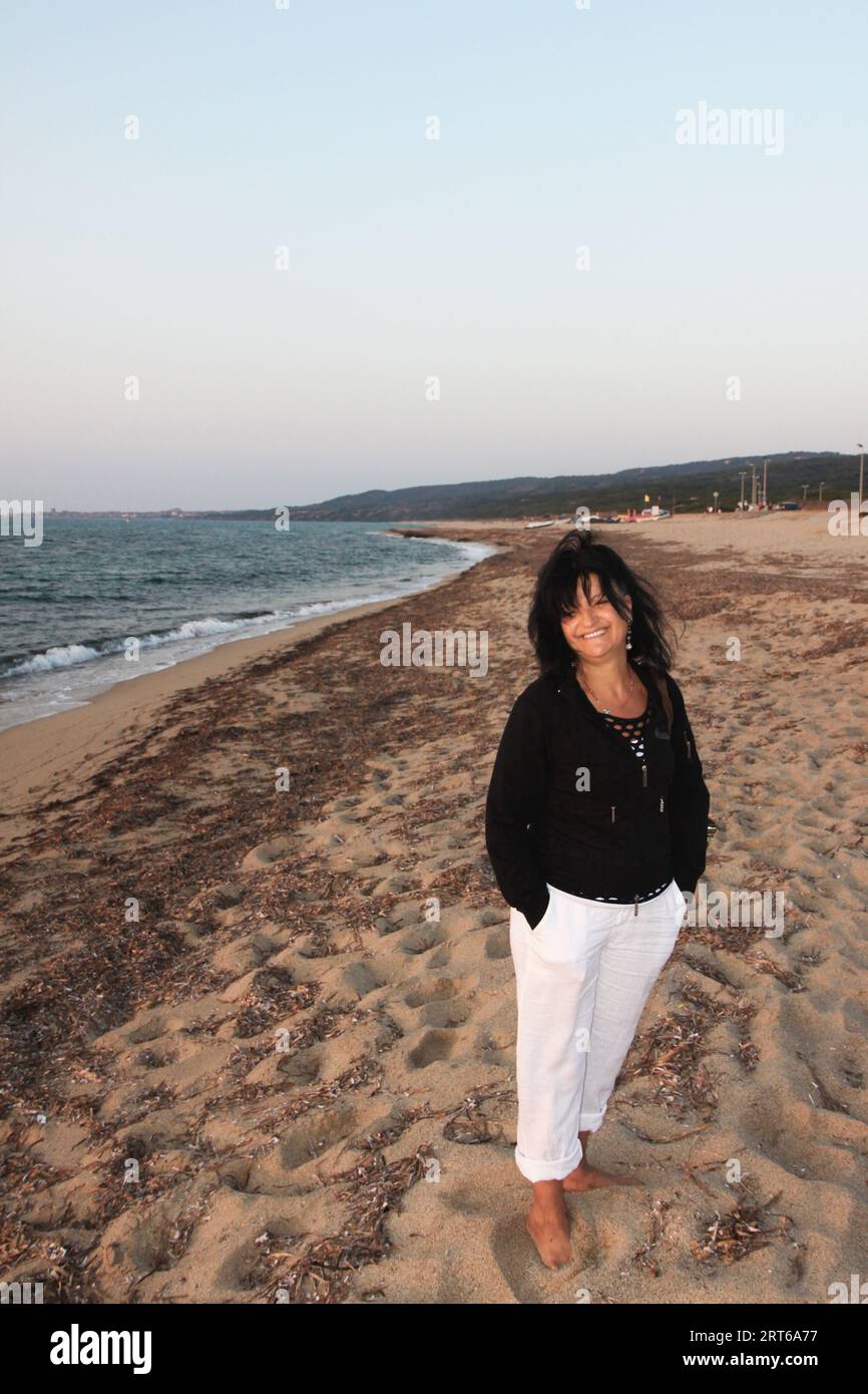 old woman walks on the cliff Pantelleria Italy Stock Photo - Alamy