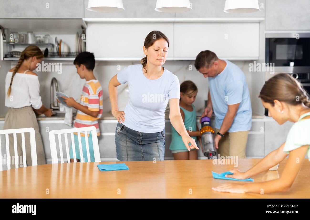 Big family members cleaning their house Stock Photo - Alamy