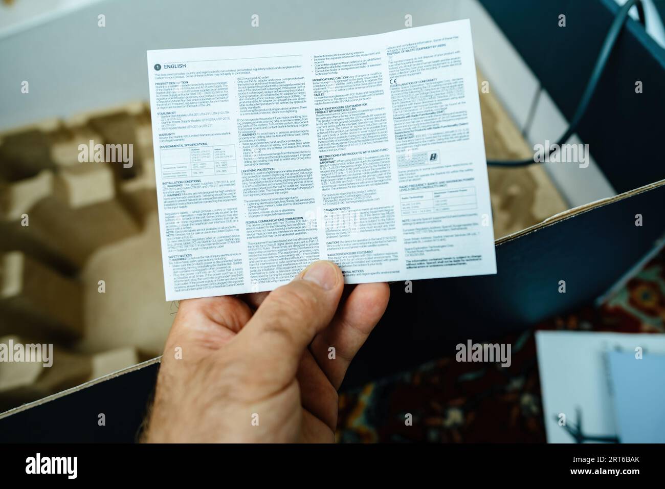 Bremen, Germany - Aug 14, 2023: POV Reading the regulatory notices ...