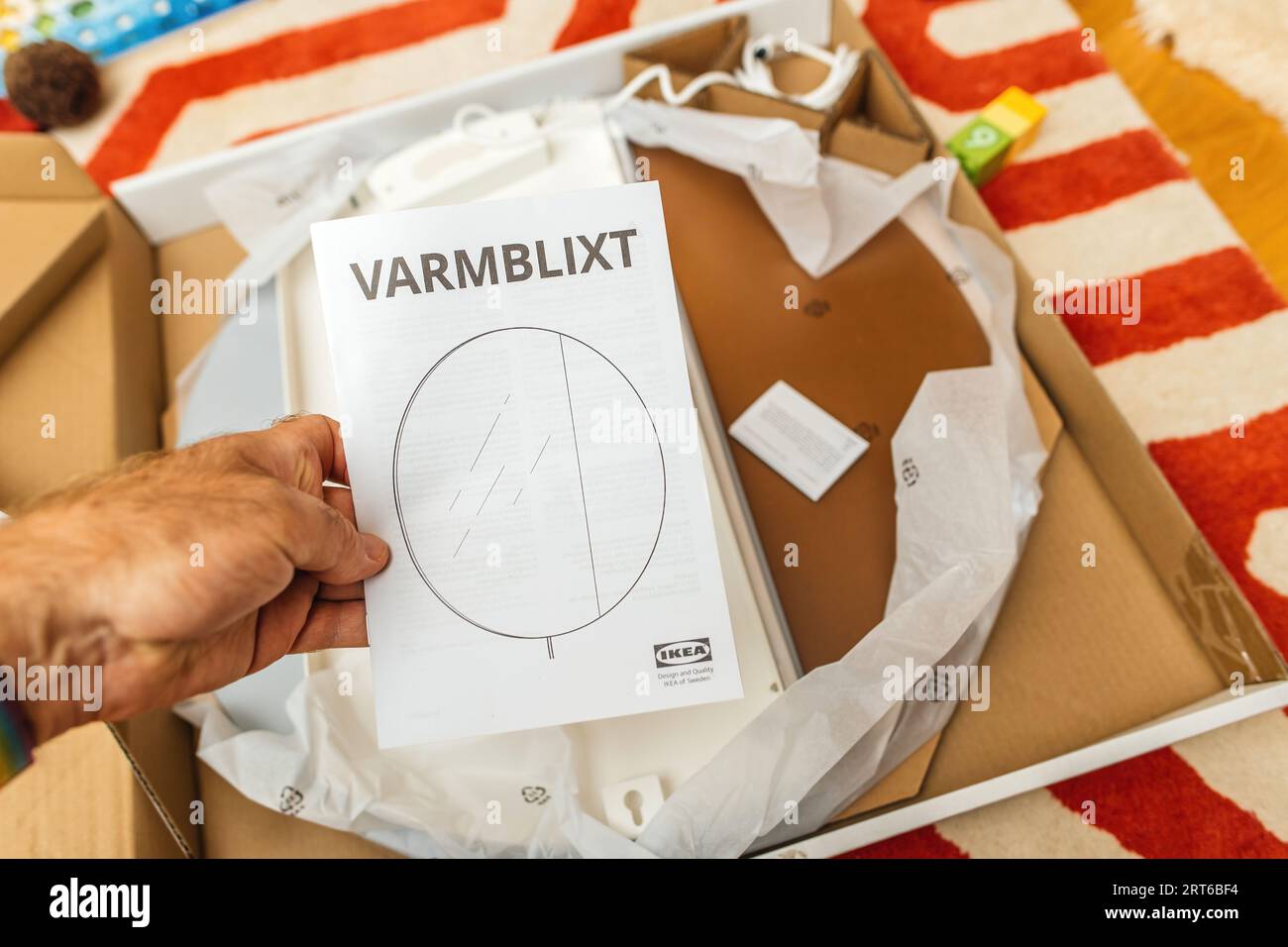 Paris, France - Jul 29, 2023: A male hand's perspective: Grasping the ...