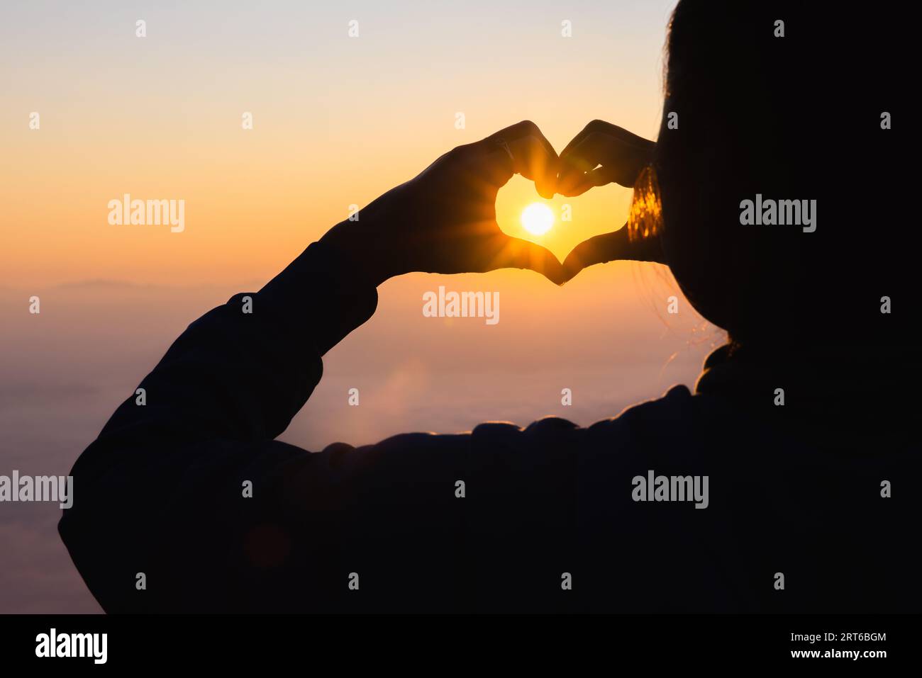 Silhouette of Human hands open palm up worship. Eucharist Therapy Bless ...