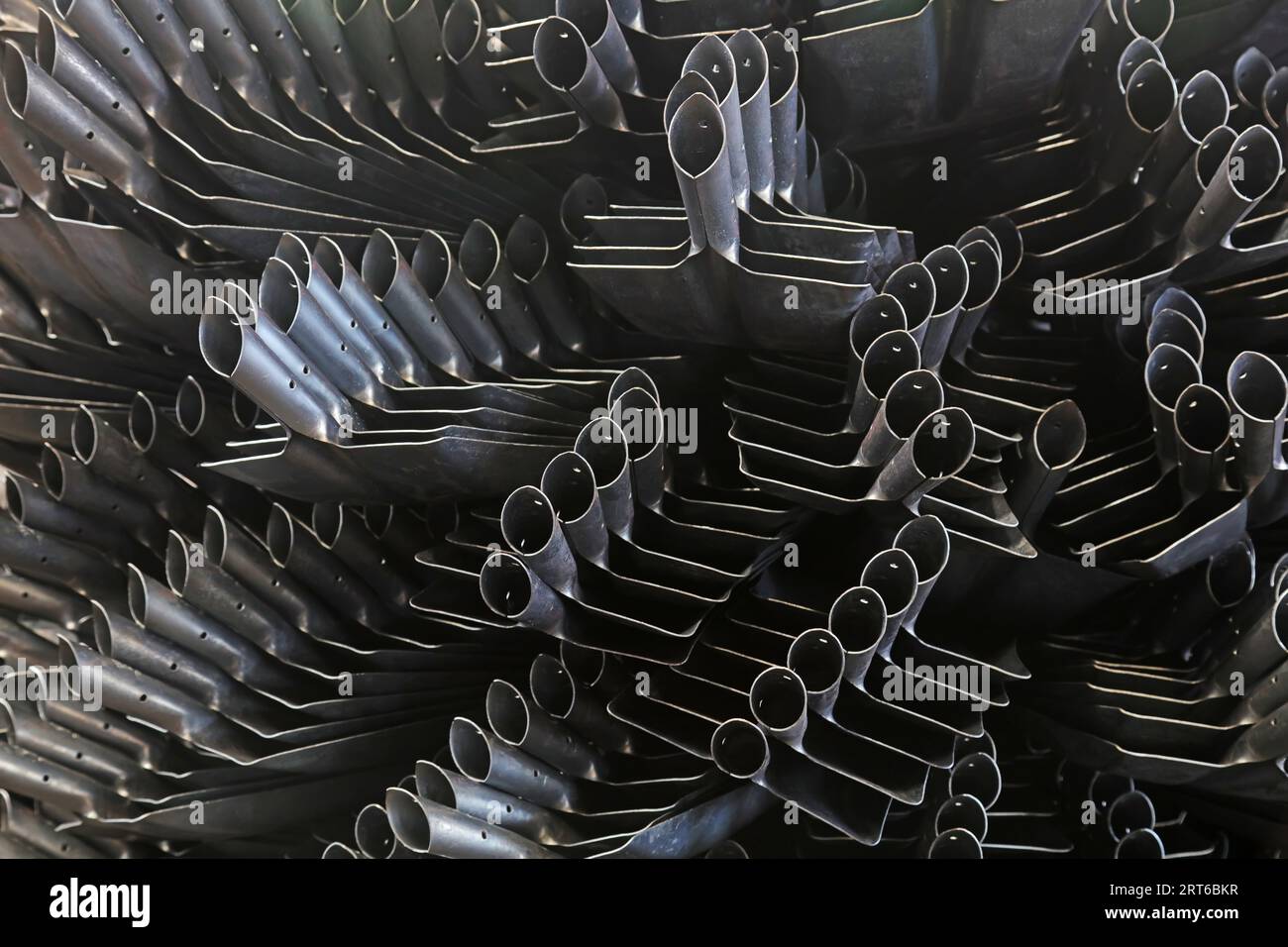 Piles of steel spades Stock Photo - Alamy