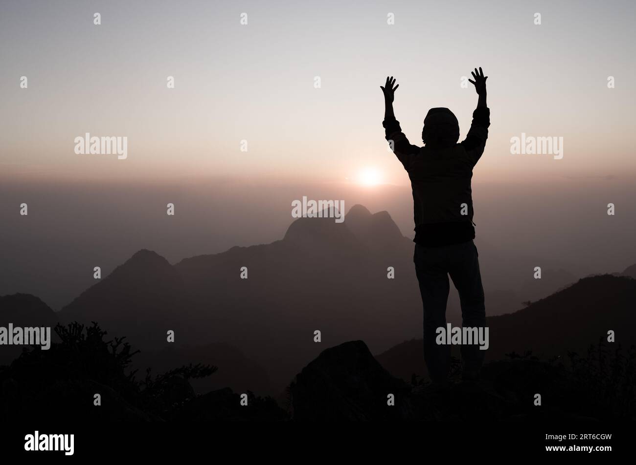 Silhouette of Human hands open palm up worship. Eucharist Therapy Bless ...