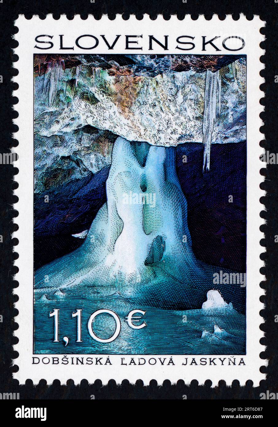 Ice Cave in Dobšiná. Postage stamp issued in Slovakia in 2011. Dobšiná ...