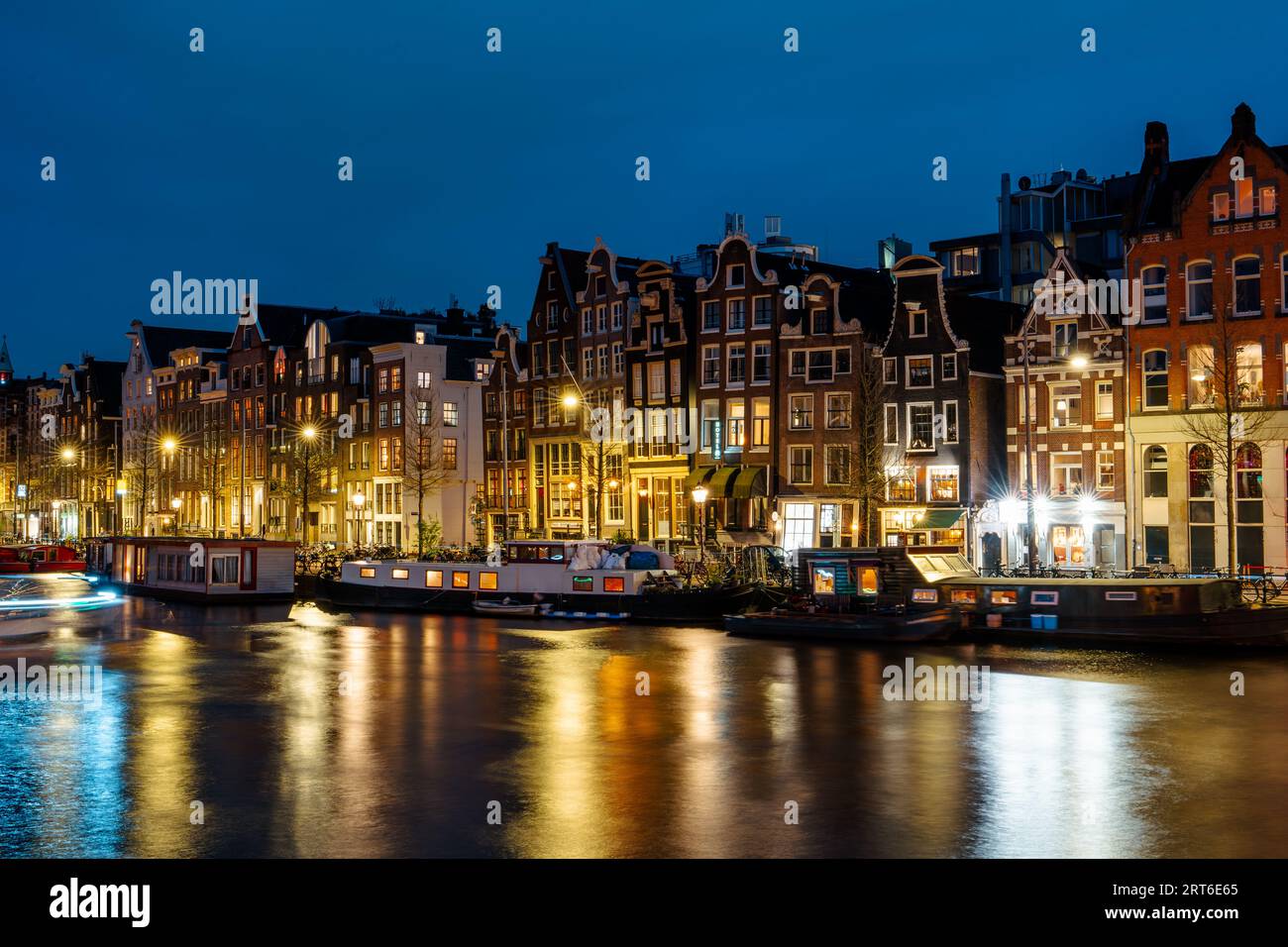 Illuminated Canals and Riverside Delights: Exploring Amsterdam After ...