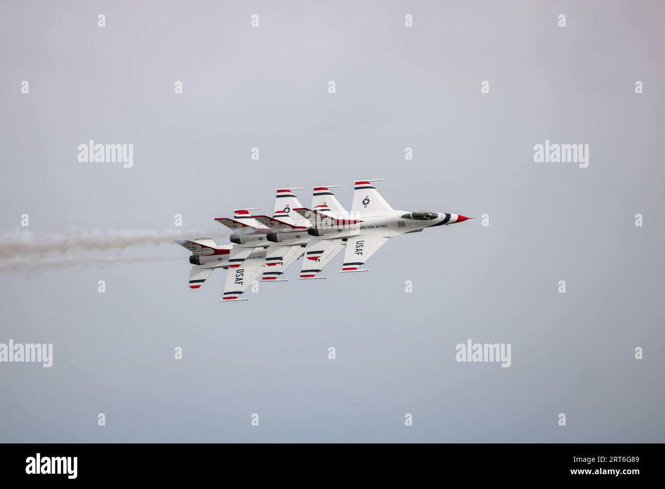 Four thunderbirds maneuver in order at the Skyfest 2022 airshow in ...