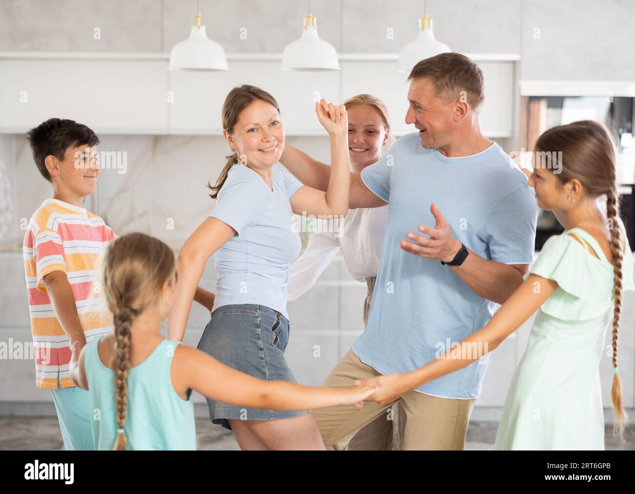 Big family dancing together Stock Photo - Alamy