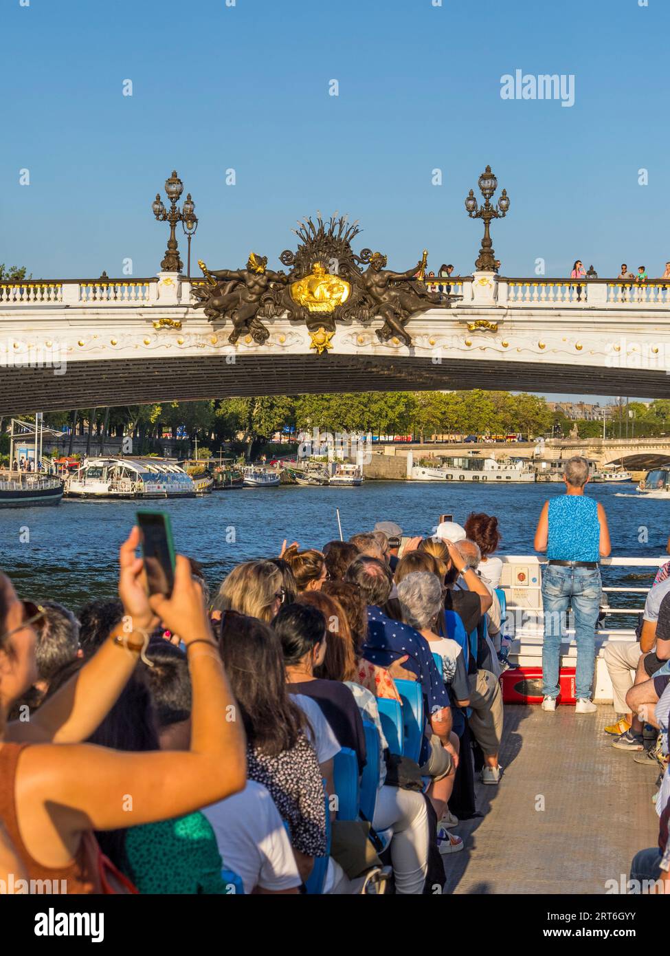 Tourists on cruse boat with, Pont Alexandre III, Bridge, River Seine ...