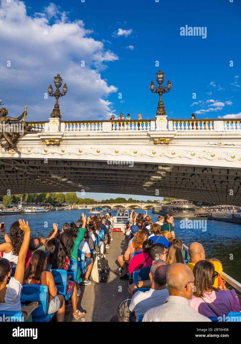 Tourists on cruse boat with, Pont Alexandre III, Bridge, River Seine ...
