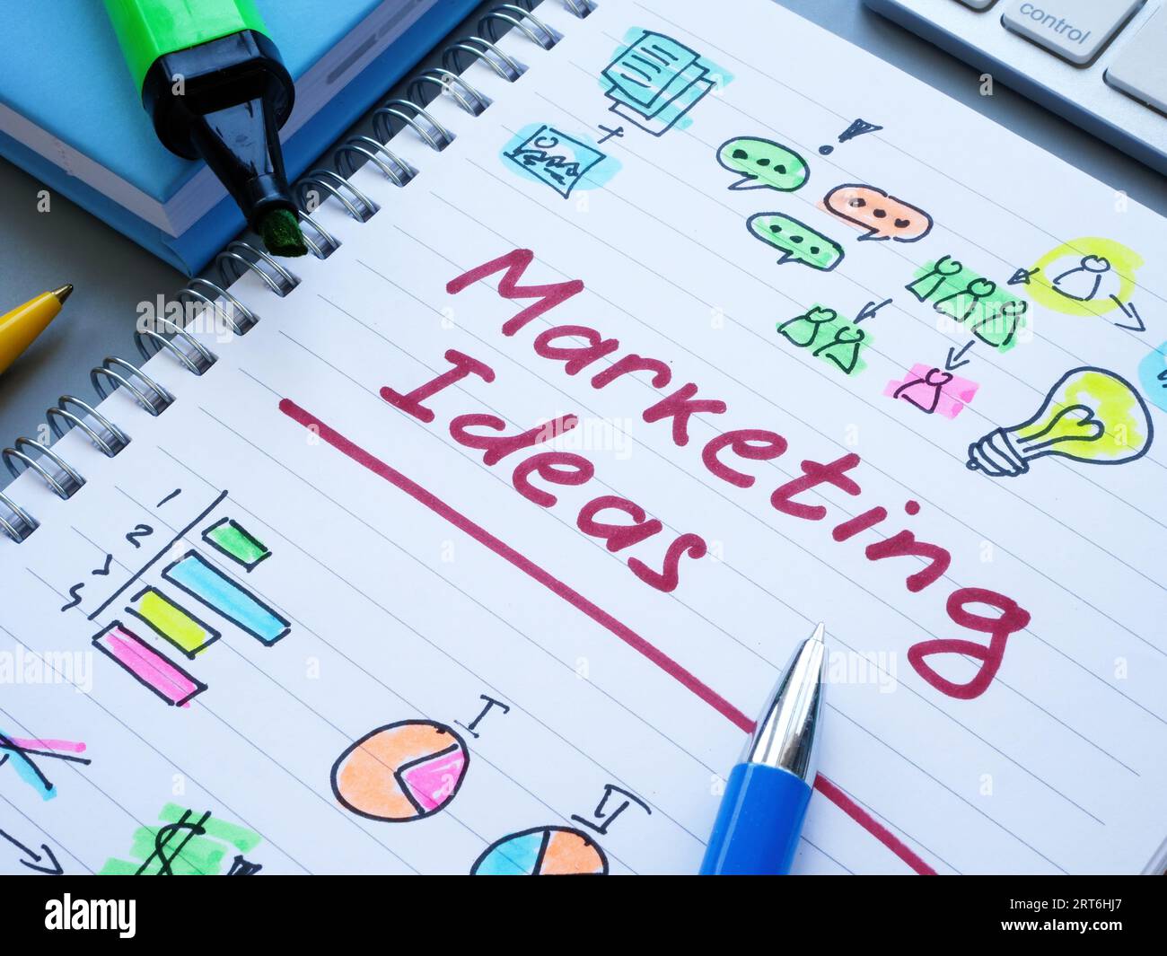 Marketing ideas written in notepad Stock Photo - Alamy