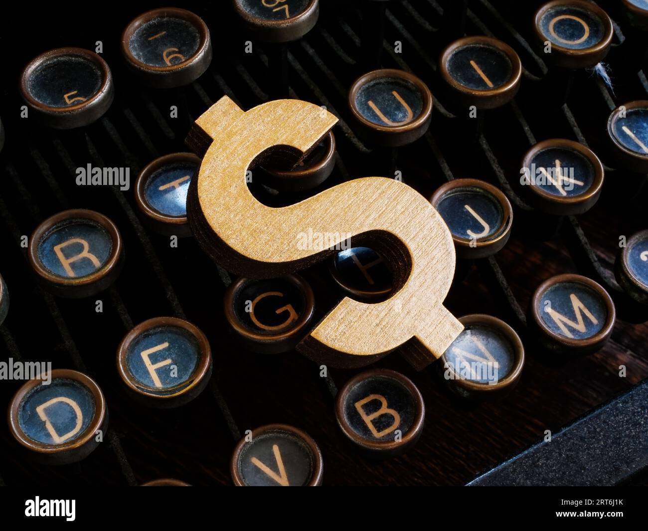 An old typewriter and a dollar sign as symbol of content monetization ...
