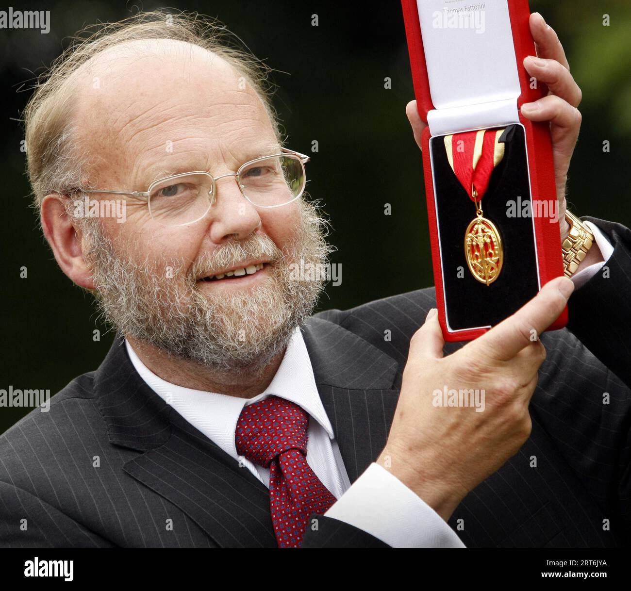 Sir Ian Wilmut with his knighthood after it was presented to him by ...