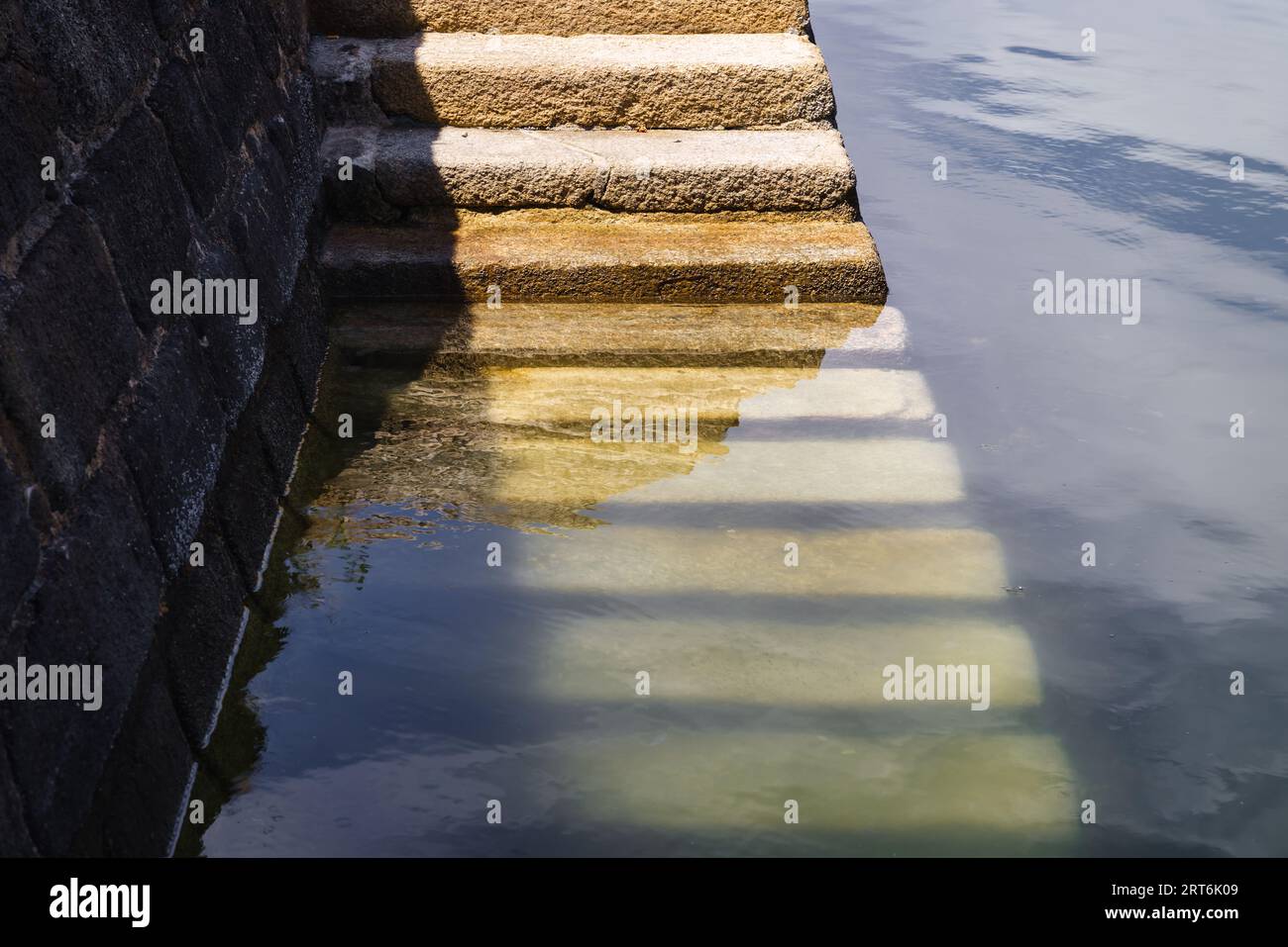 picture of a stone staircase leading into the water on a quay Stock ...