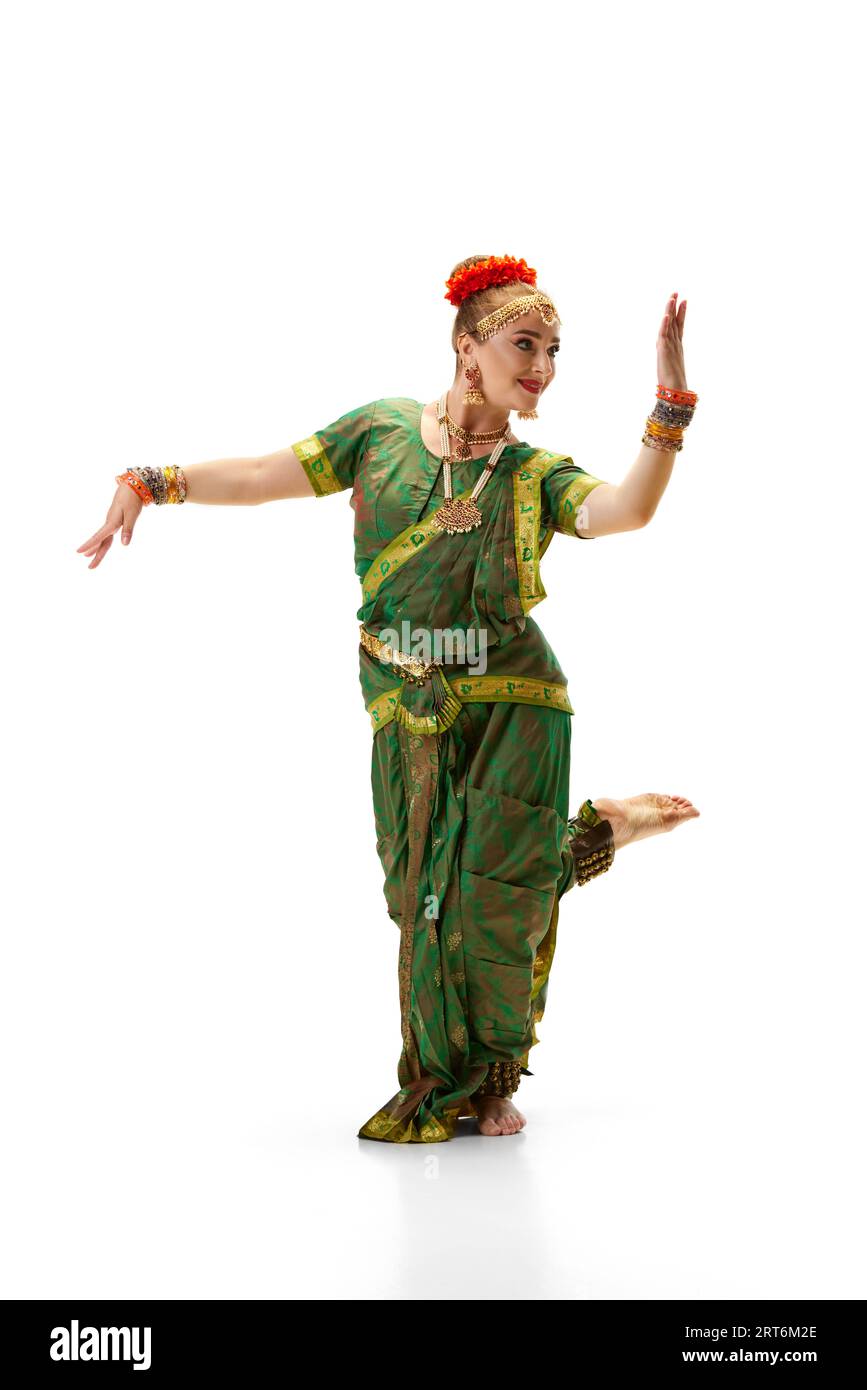 Artistic dancer, woman in traditional indian dress dancing against ...