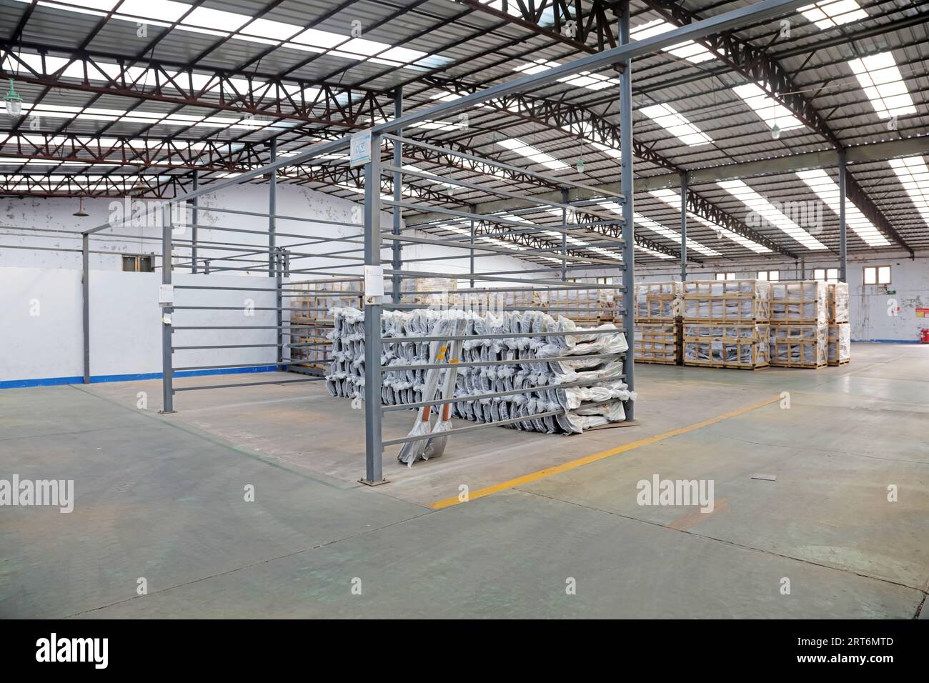 Industrial warehouse in a factory Stock Photo - Alamy