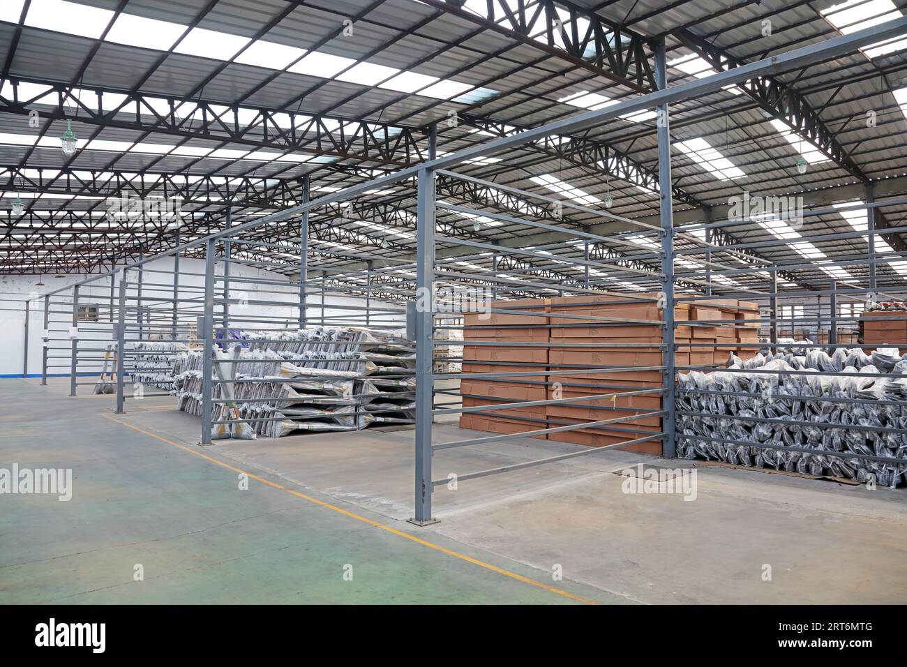 Industrial warehouse in a factory Stock Photo - Alamy