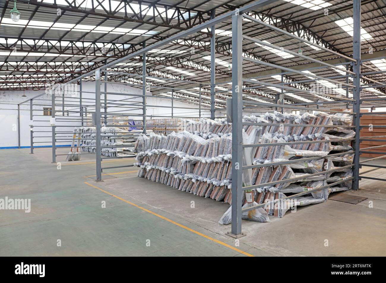 Industrial warehouse in a factory Stock Photo - Alamy