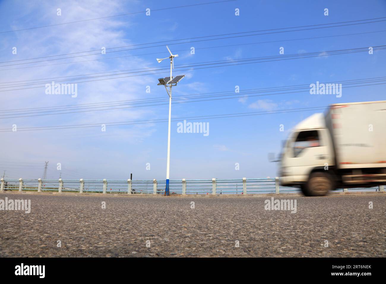 Electric towers and moving vehicles Stock Photo - Alamy