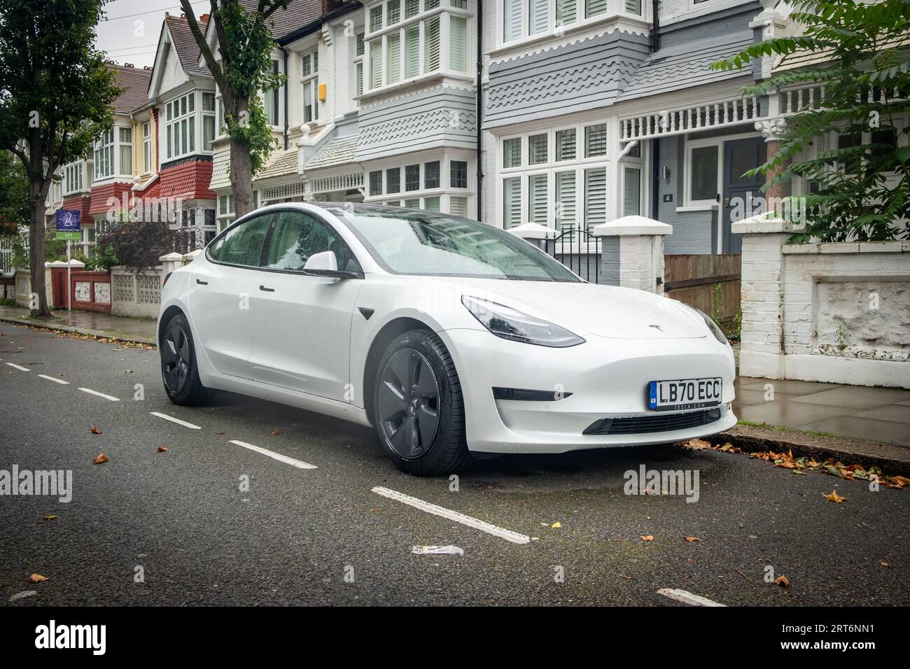 LONDON- AUGUST 8, 2023: Tesla Model 3 parked on London residential ...