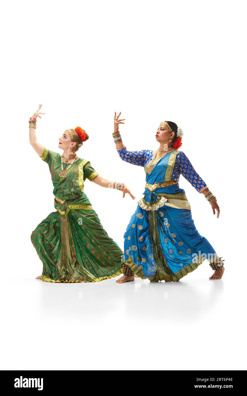 Sattriya dance. Women, in beautiful traditional indian dresses dancing ...