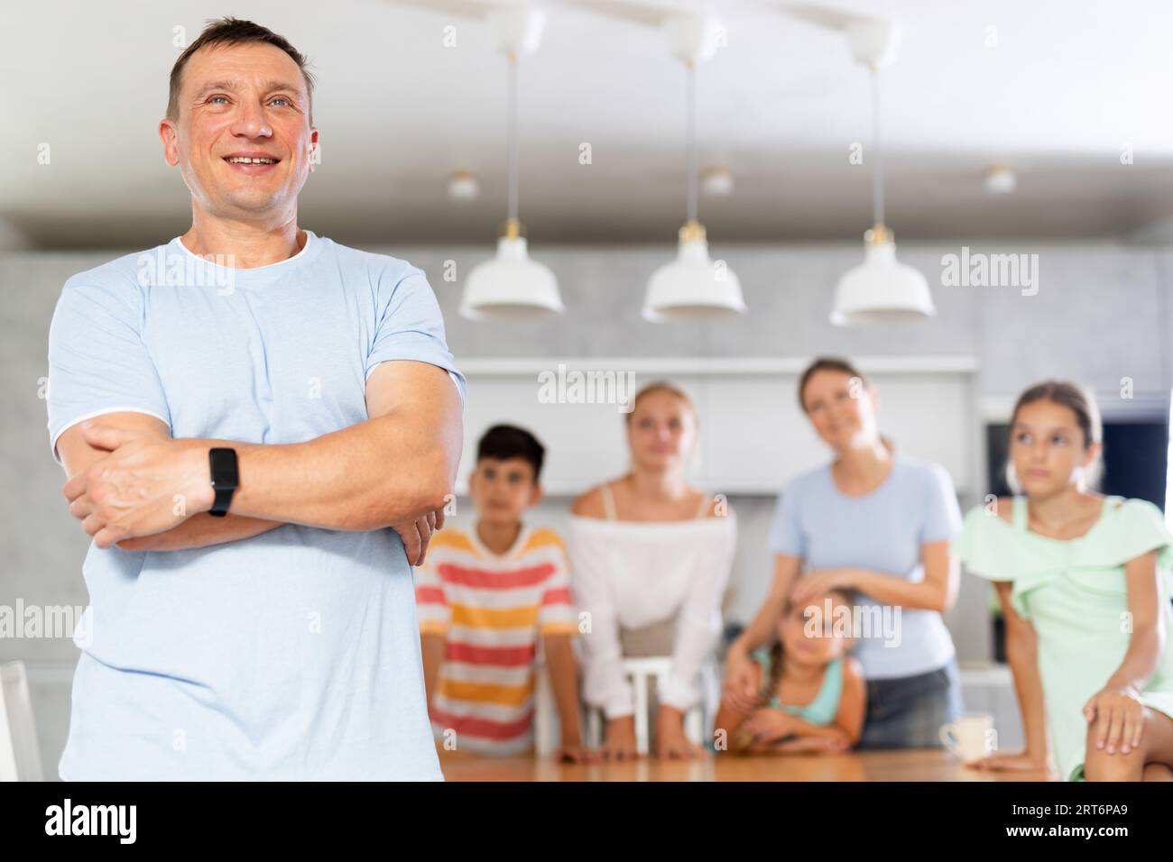 Portrait of happy father of large family against the background of ...