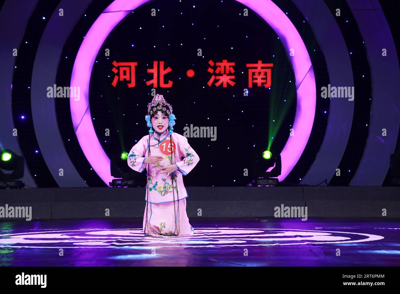Chinese girl singing on stage hi-res stock photography and images - Alamy