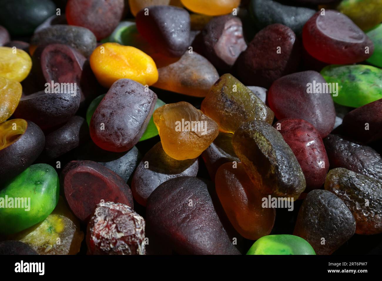 Beeswax stones are stacked together in a handicraft workshop, China ...