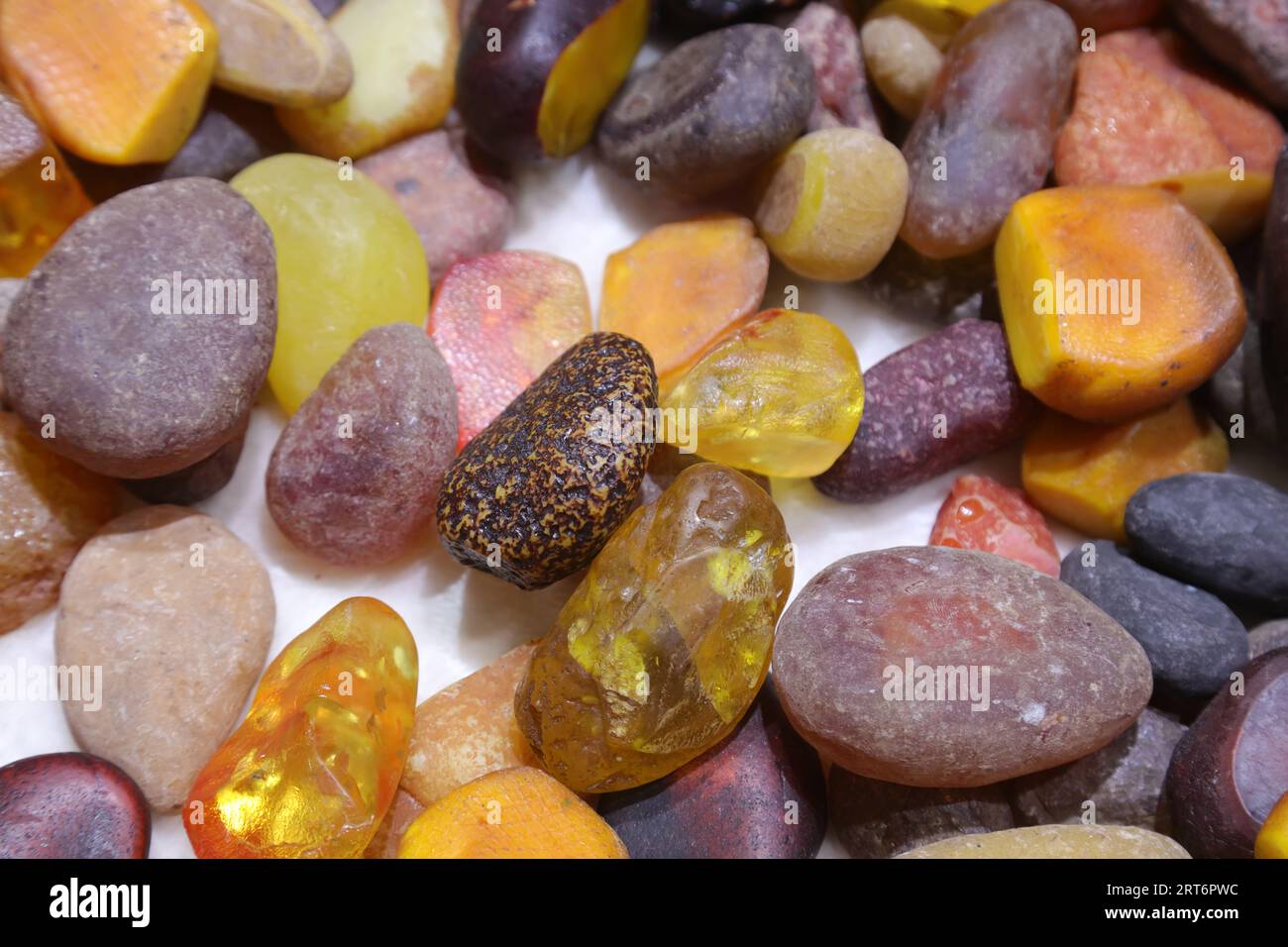 Beeswax stones are stacked together in a handicraft workshop, China ...