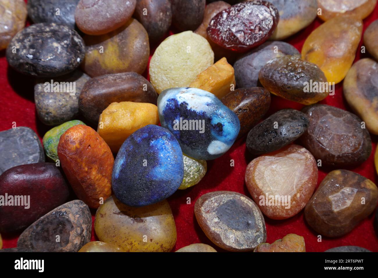 Beeswax stones are stacked together in a handicraft workshop, China ...