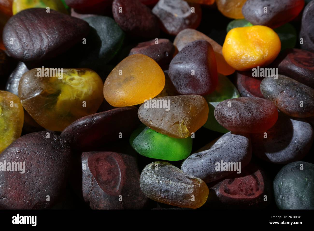 Beeswax stones are stacked together in a handicraft workshop, China ...