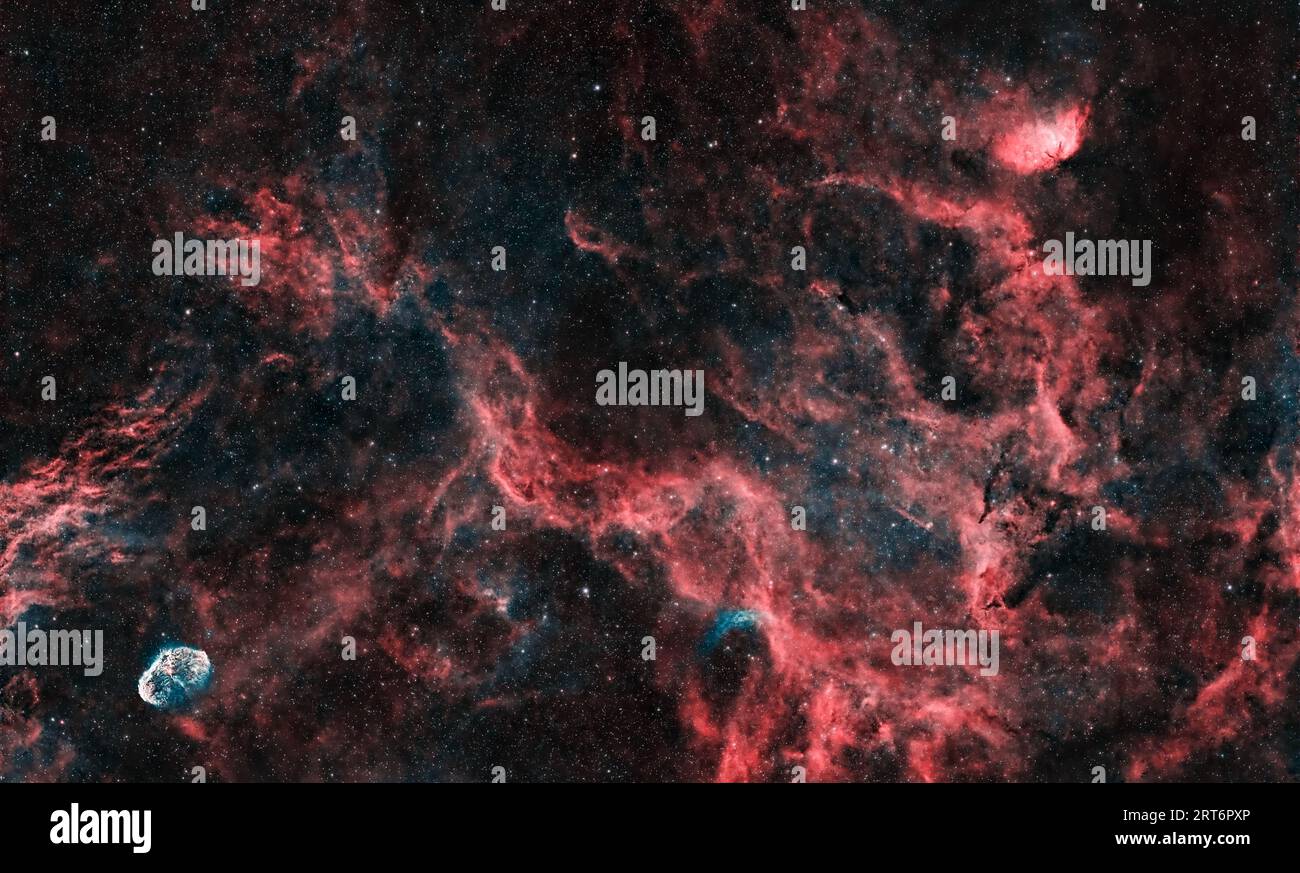 Captivating cosmic beauty: The Crescent and Tulip Nebulae dance across ...